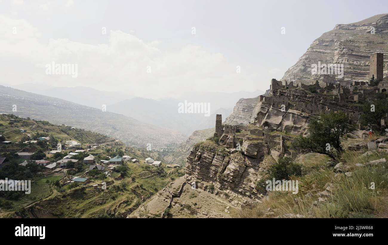 Ruins of ancient village with abandoned building stone walls on a ...