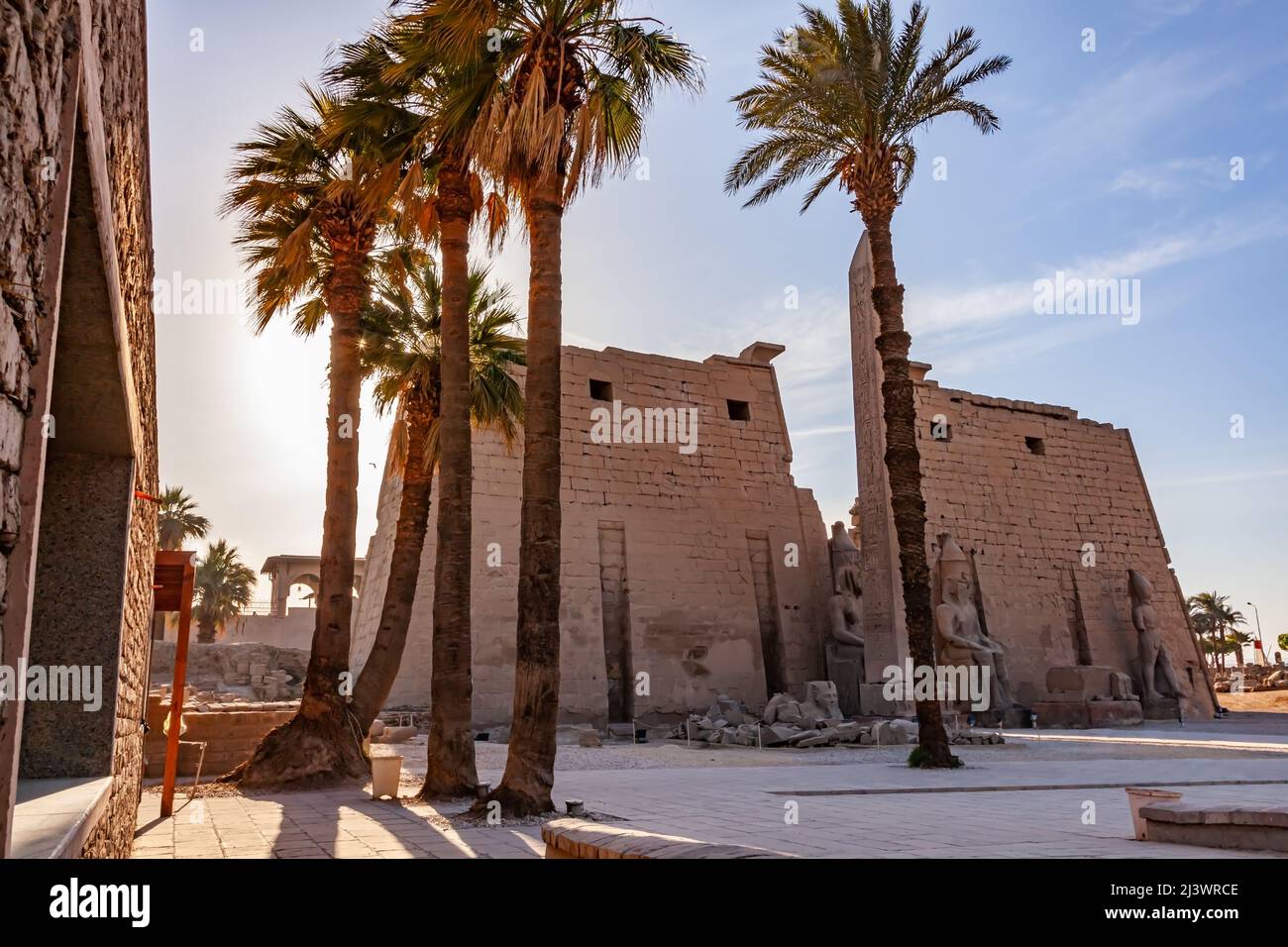 Morning view of the first pylon of famous Luxor Temple with statues of ...