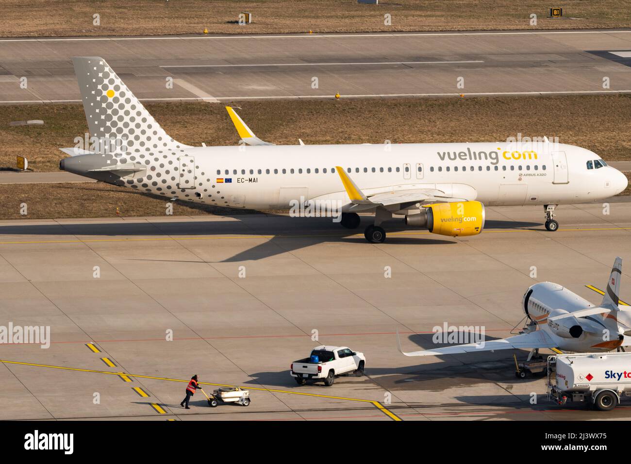 Zurich, Switzerland, March 2, 2022 Vueling Airbus A320-214 aircraft is taxiing to its take off ...