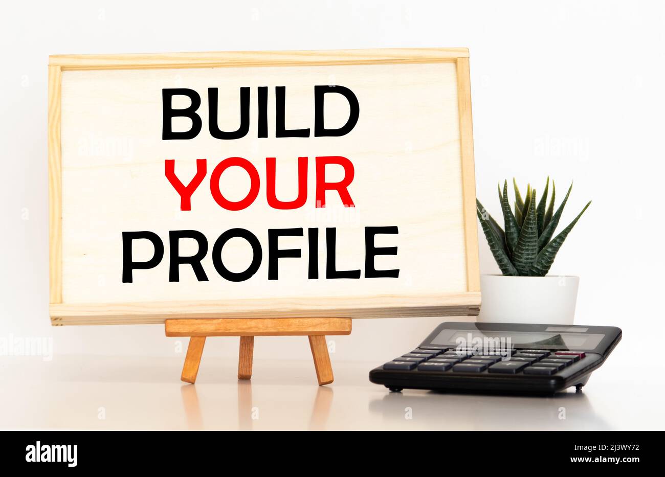 text Build your profile on torn paper, business concept Stock Photo - Alamy