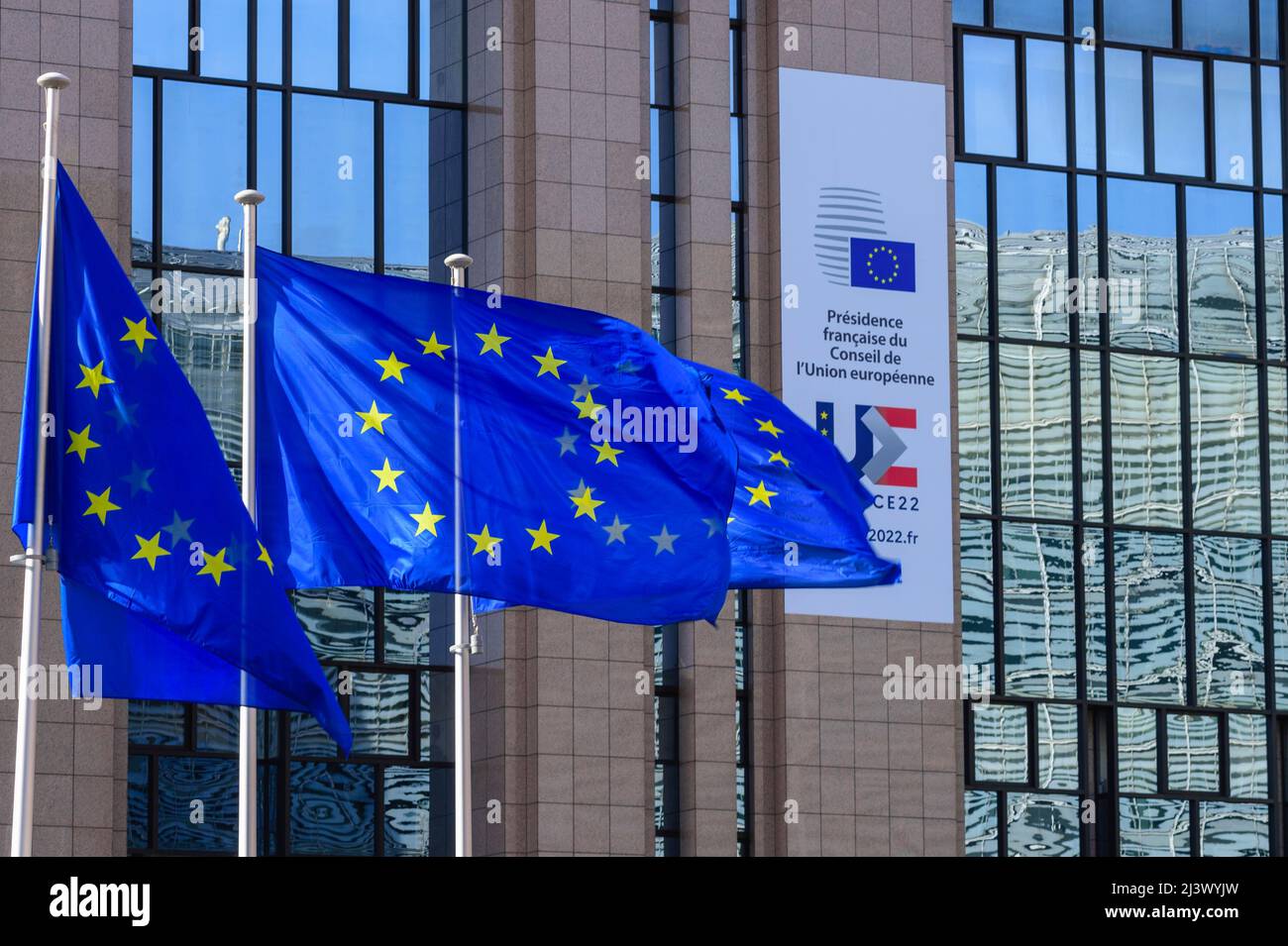Several official European Flags with the blue and the yellow stars are ...