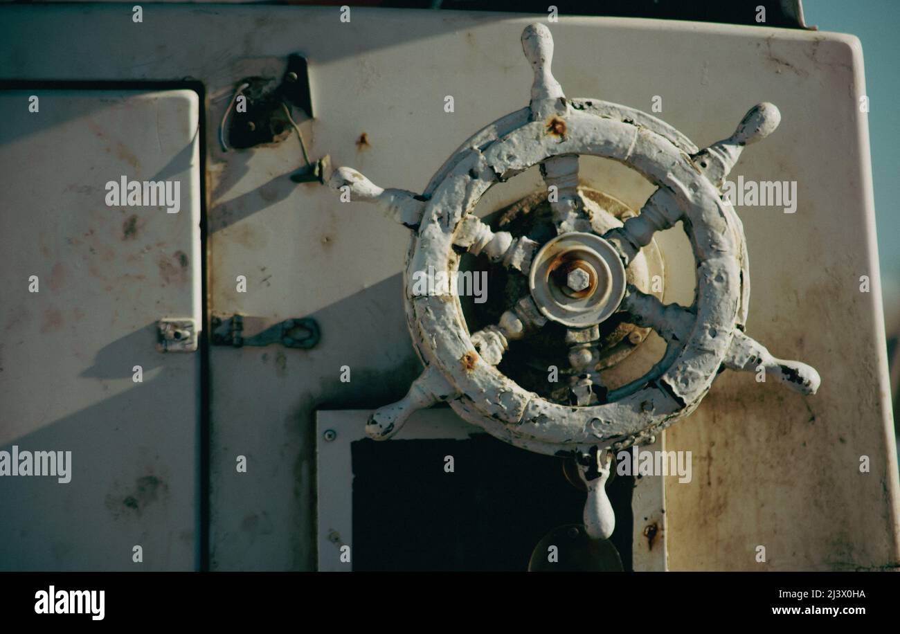 weathered ship steering wheel from old fishing boat Stock Photo - Alamy