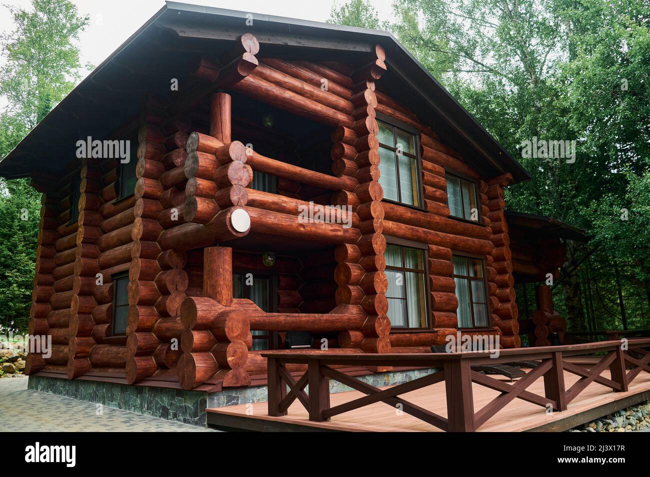 Wooden mountain house built from wood logs. Beautiful log house with ...