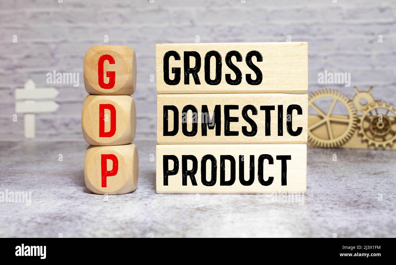 GDP word written on wood block. GDP text on wooden table for your desing, concept Stock Photo ...