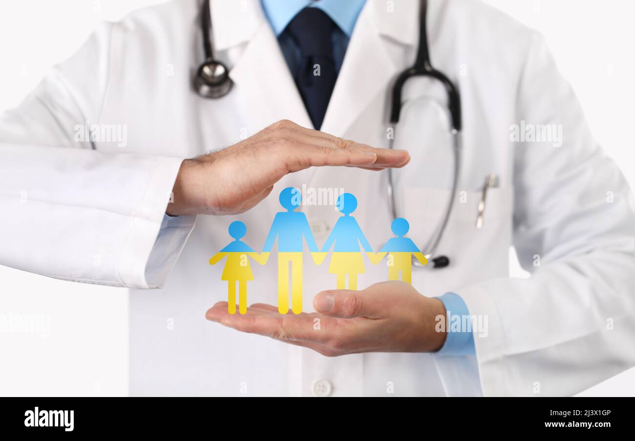 Ukraine medical aid concept, close-up of doctor hands showing symbol ...