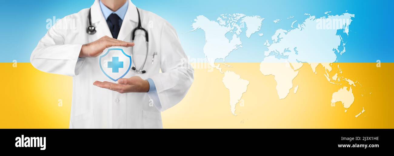 Ukraine medical protection aid concept, doctor hands showing the symbol ...
