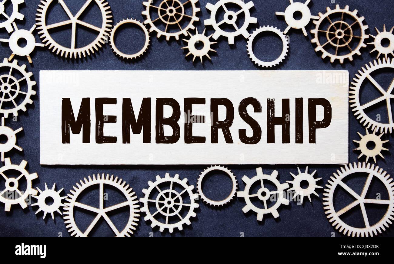 The word MEMBERS ONLY written on a black background near pencils, a ...