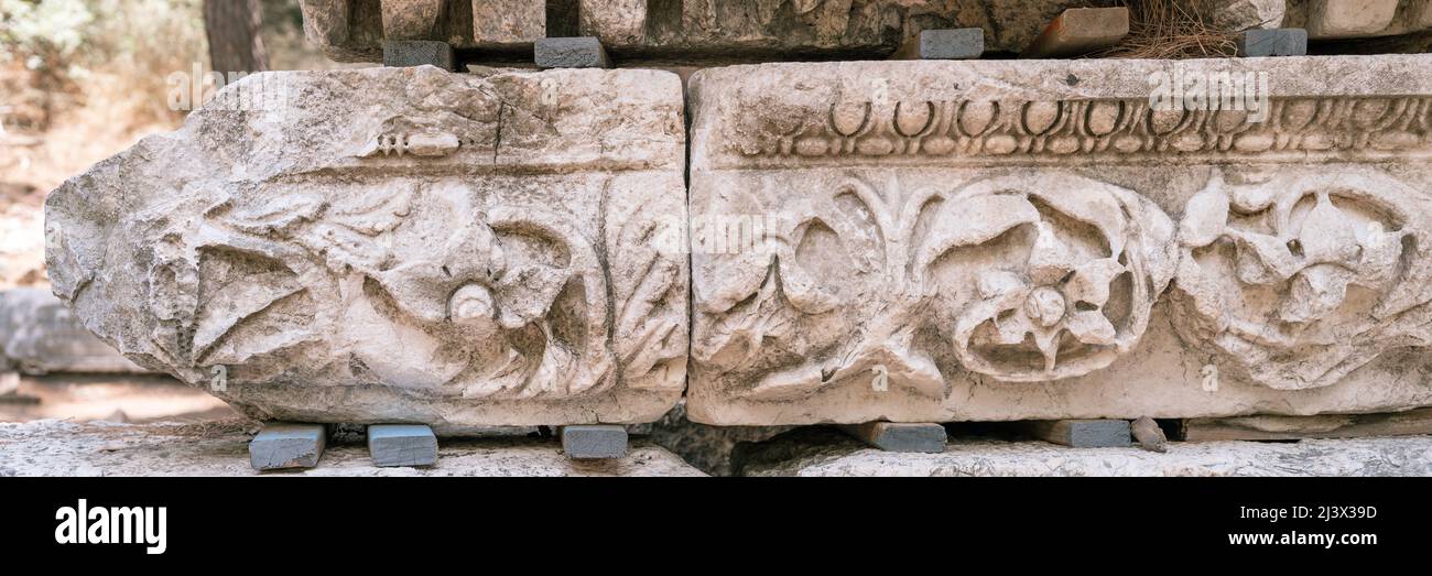 ruined construction of the old stone building with inscriptions in the ...