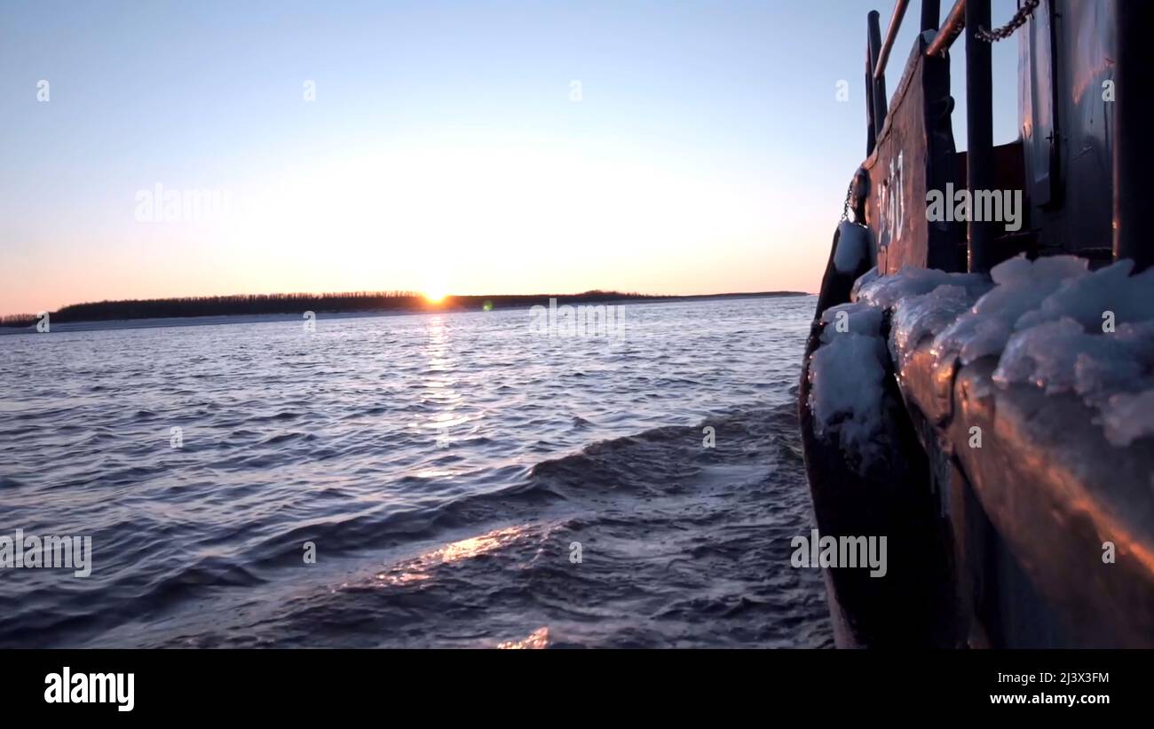 View from the boat. Clip. A boat with a small amount of snow on it ...