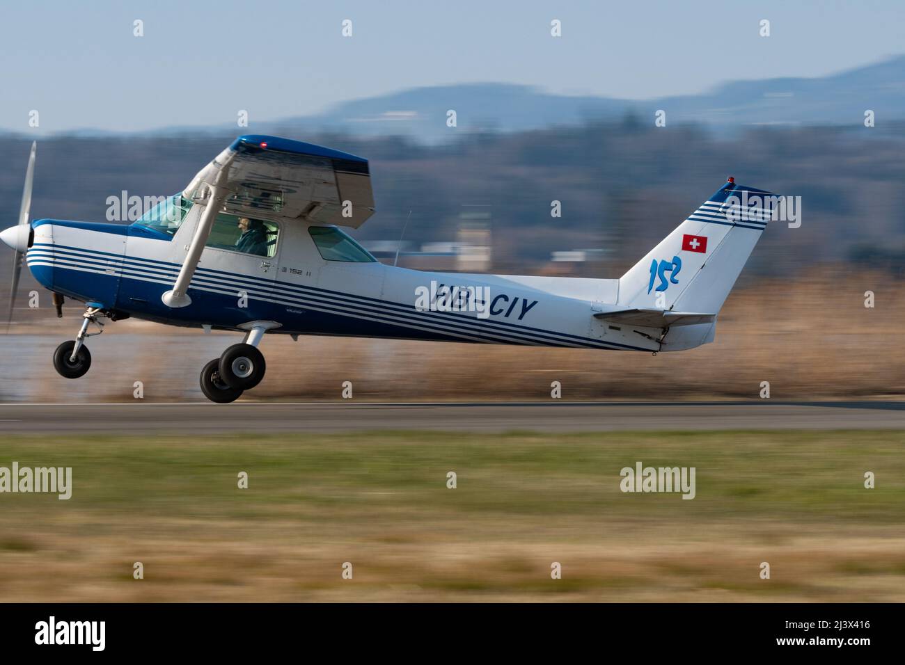 Wangen-Lachen, Switzerland, March 27, 2022 Cessna 152 propeller plane ...