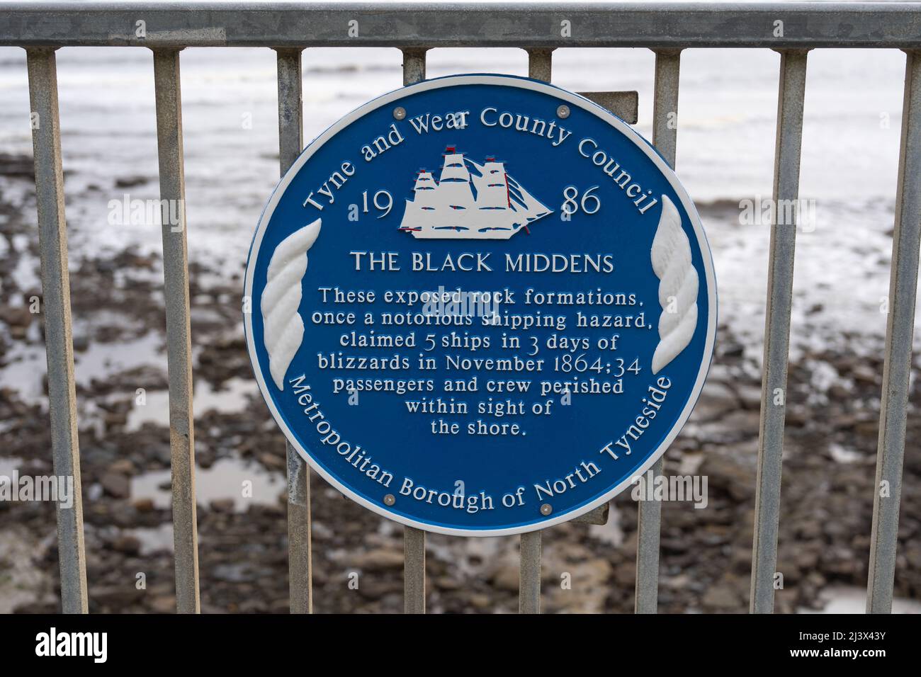 Blue plaque at the Black Middens rocks in Tynemouth, North Tyneside, UK ...