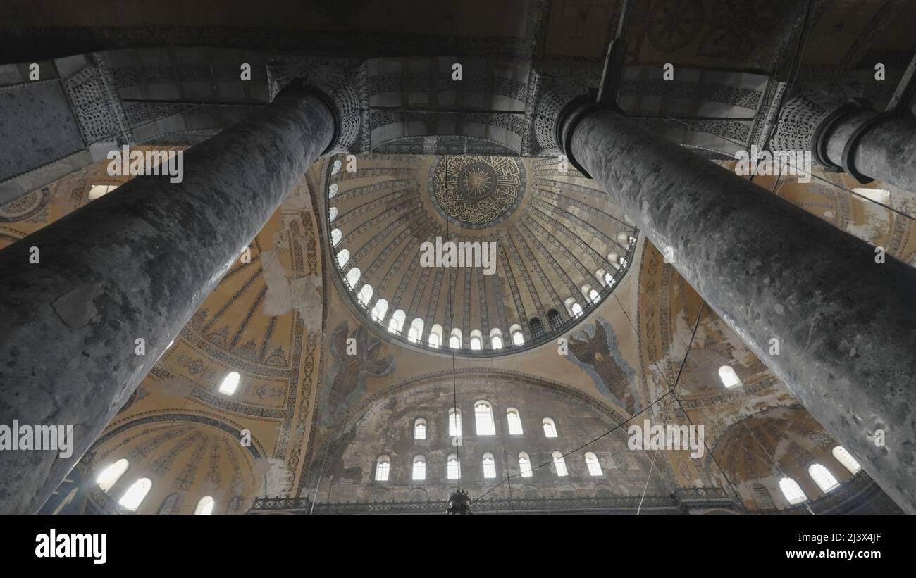 Columns and vault of temple. Action. View from below on beautiful inner ...