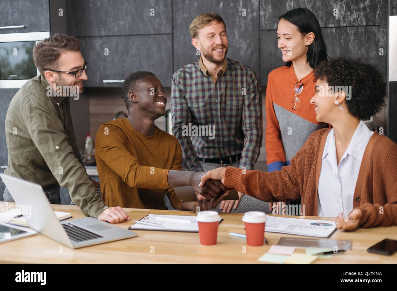 Discussing work business colleagues using hi-res stock photography and ...