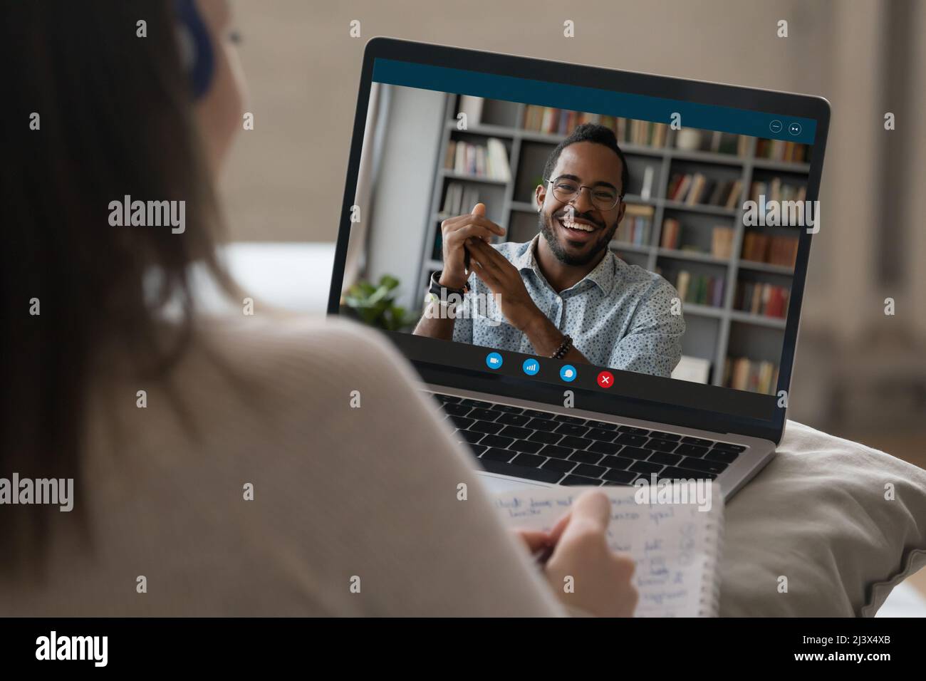 Student girl in headphones making video call Stock Photo - Alamy