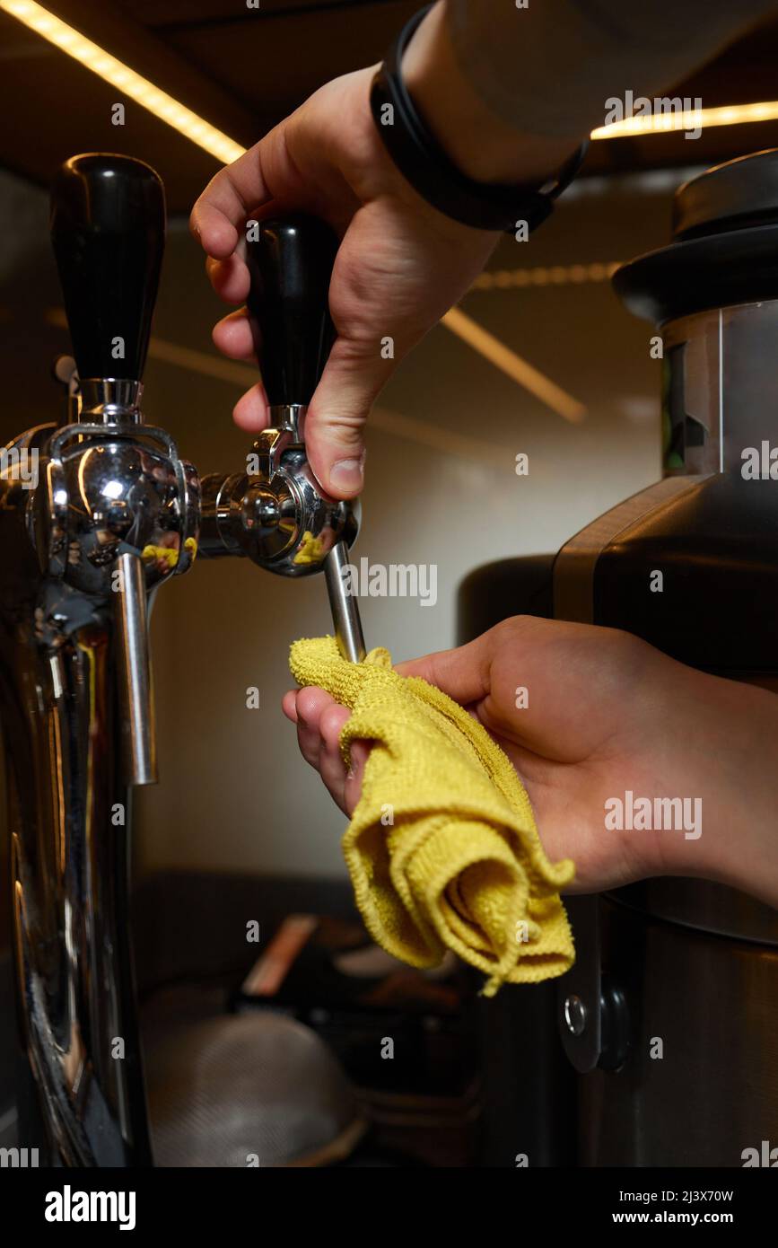 A perfectly lit cleaning cloth sat upon an espresso machine Stock Photo ...