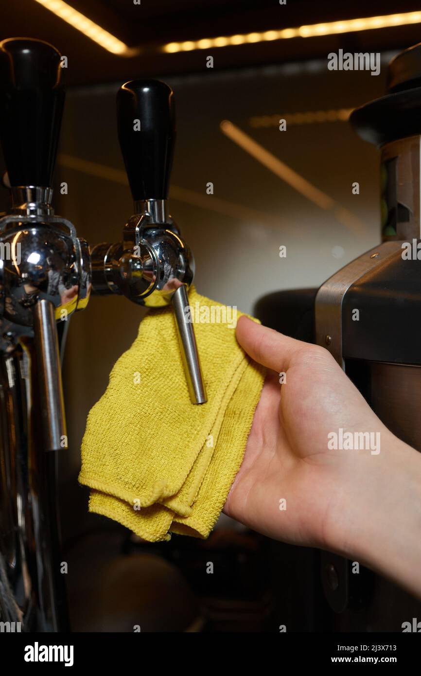 A perfectly lit cleaning cloth sat upon an espresso machine Stock Photo ...