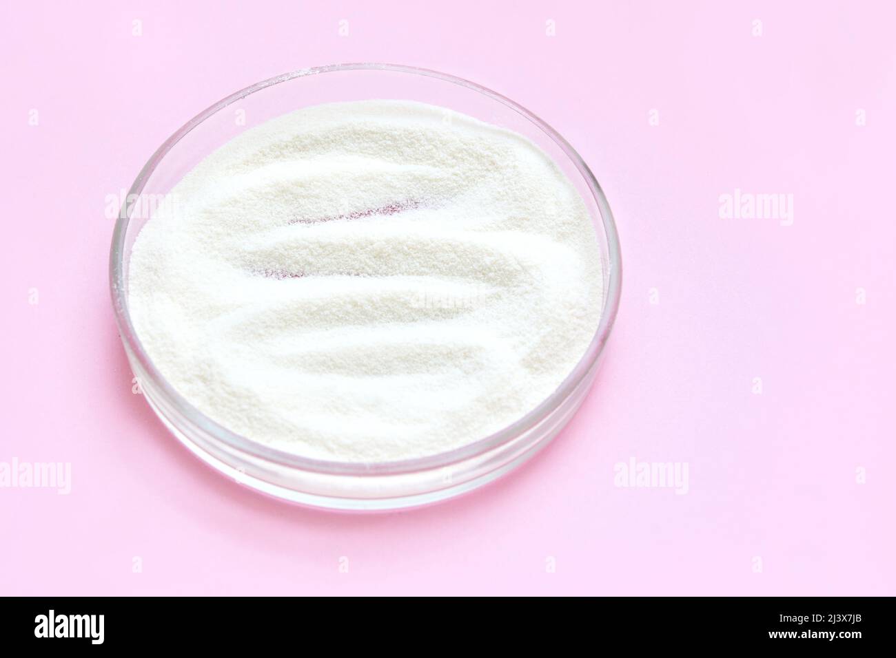 Collagen white powder. Pastel color background. Health product. Woman ...