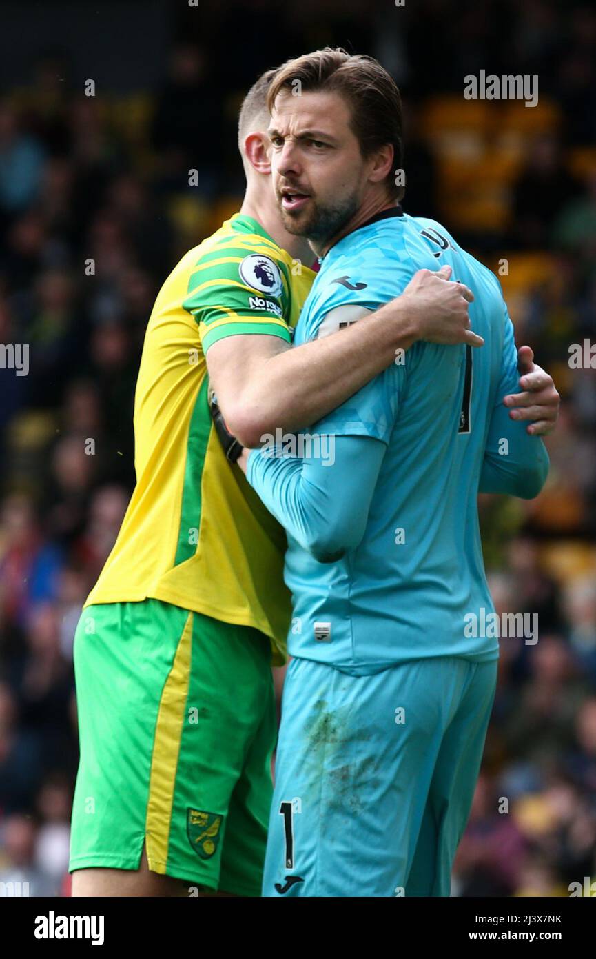 Ben Gibson #4 of Norwich City hugs Tim Krul after he makes a save Stock ...