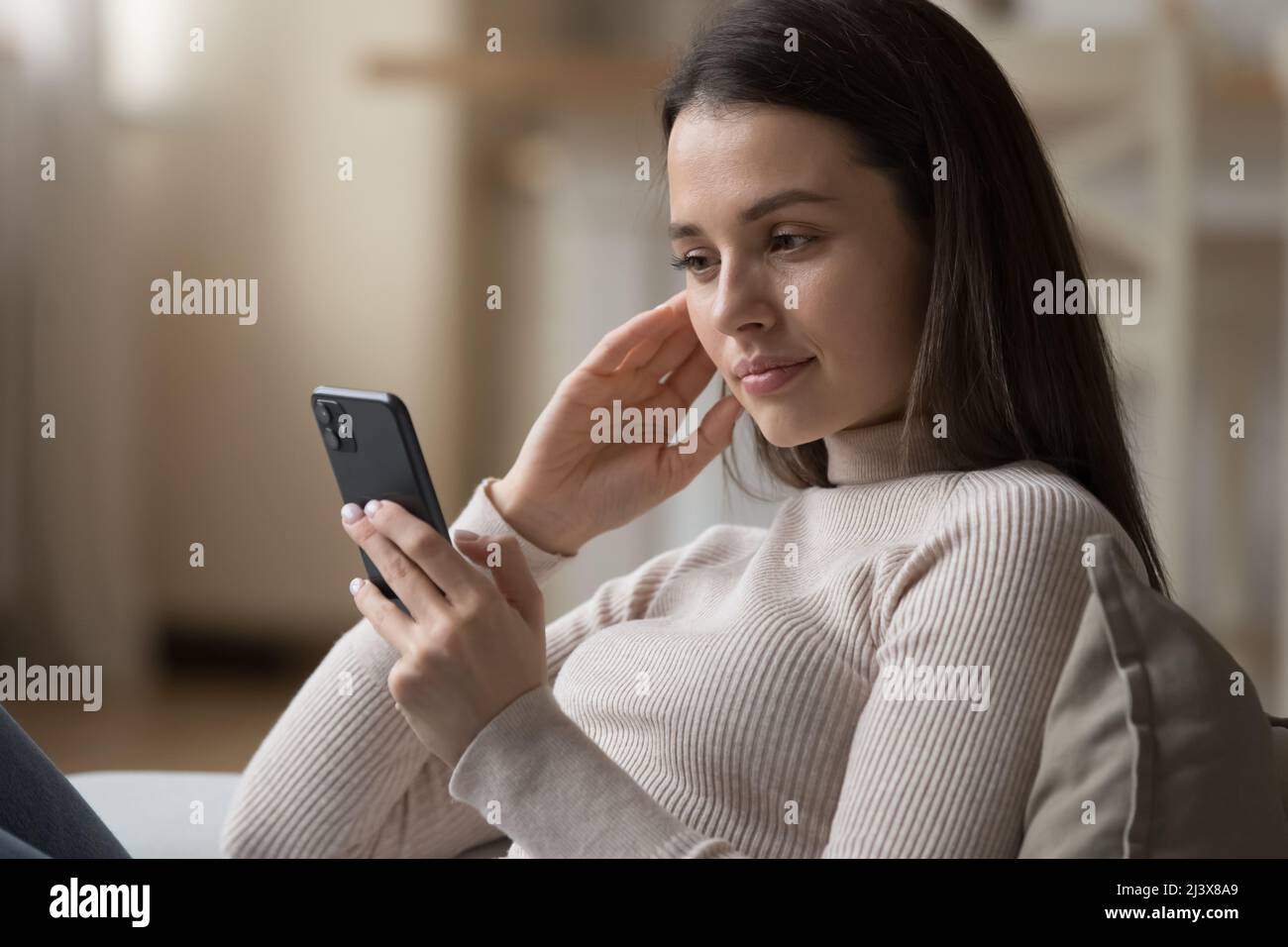 Beautiful young smartphone user woman reading text message Stock Photo ...