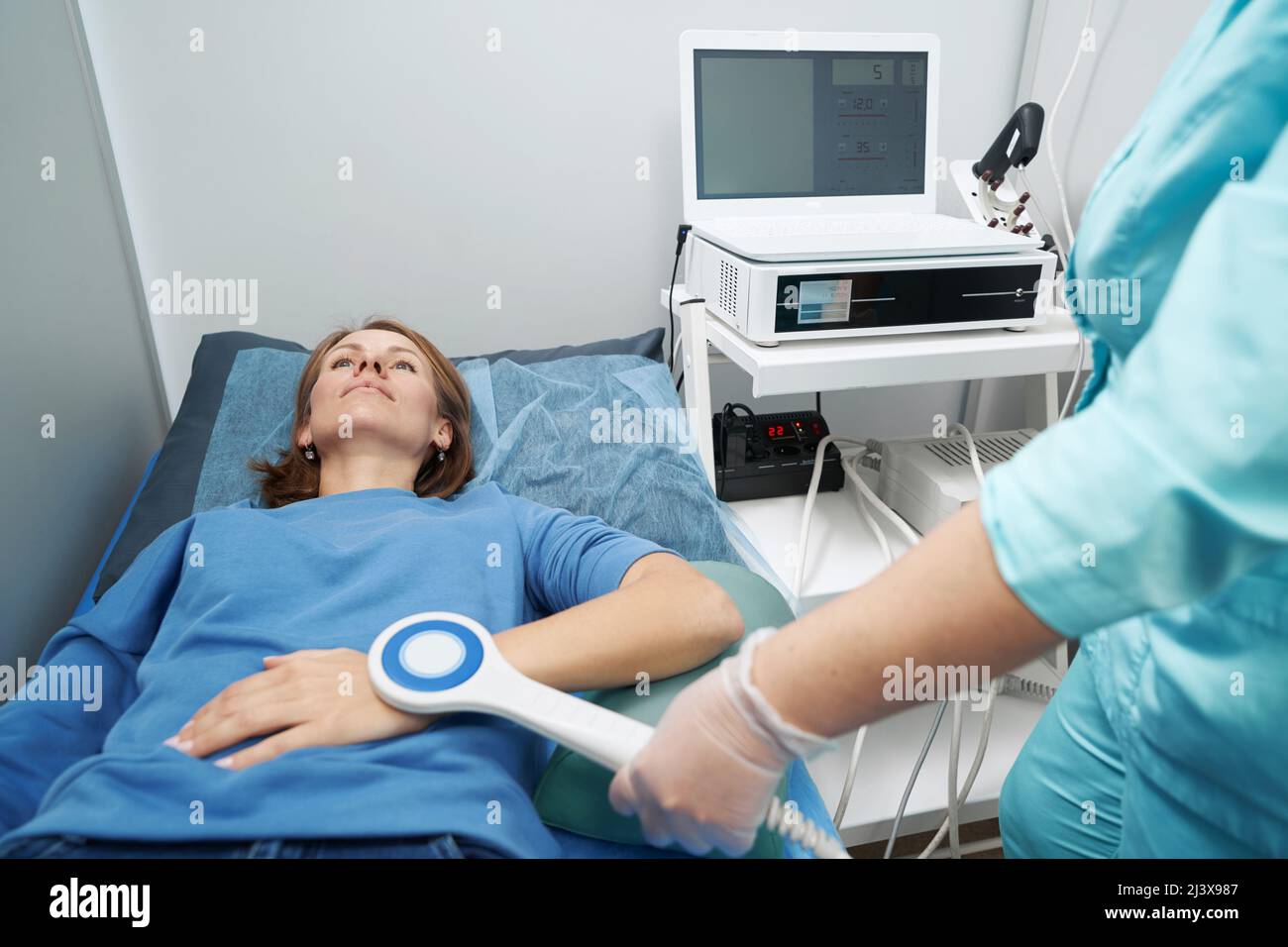 Woman receiving physiotherapy hi-res stock photography and images - Alamy