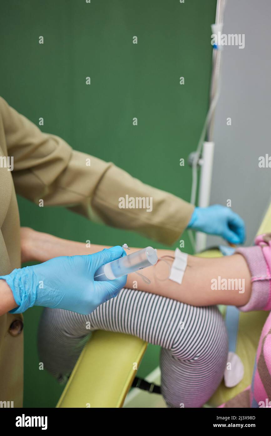 Doctor drawing blood sample from arm for blood test, close-up ...