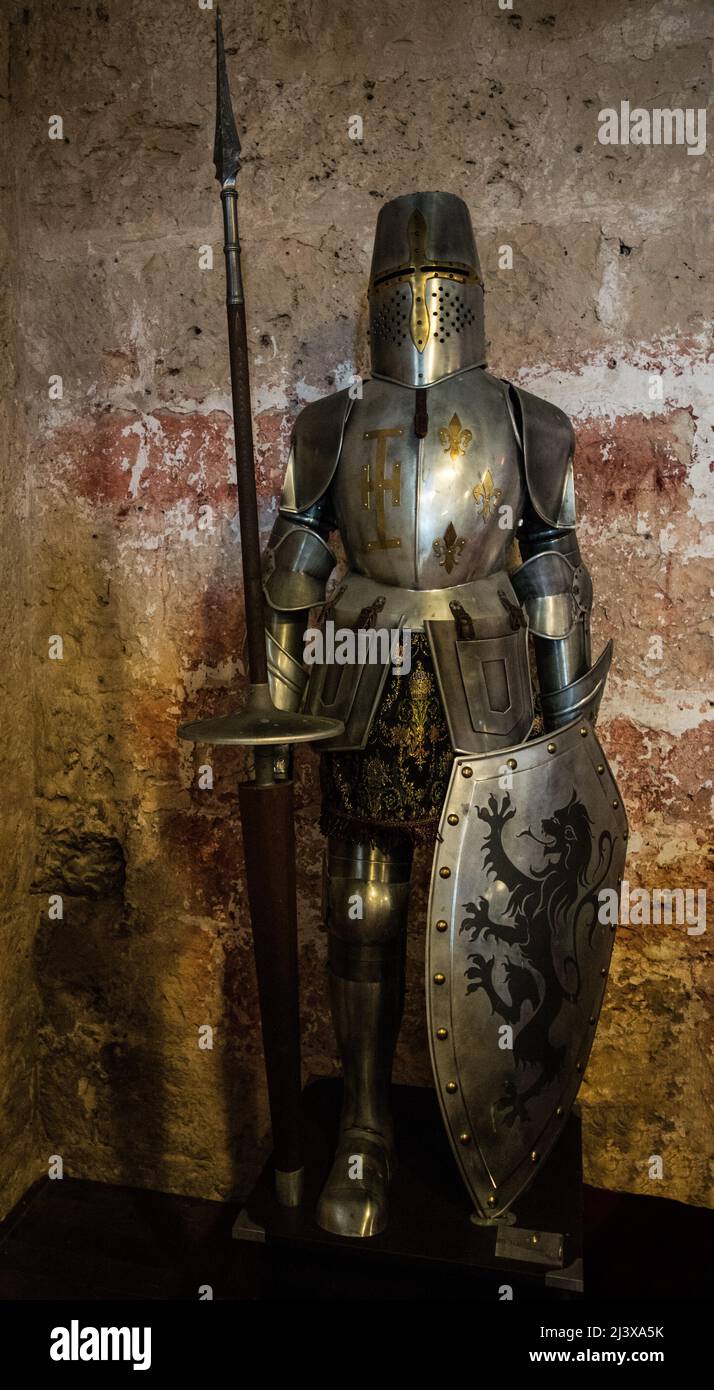 Metal knight armor, front with spear and shield Stock Photo - Alamy
