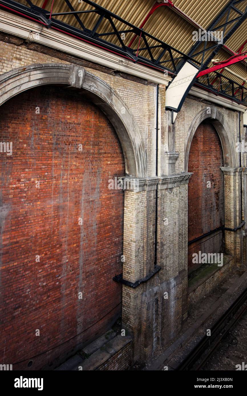 Brick and concrete railway arches at Paddington Station, London ...