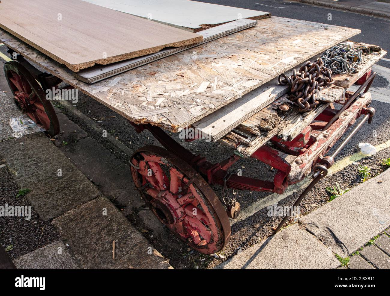 Fruit and vegetable seller's wagon/cart, very old and worn, parked in ...