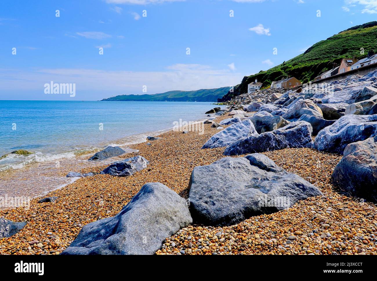 A scenic landscape view of the pebbles and rocks on the beach at ...