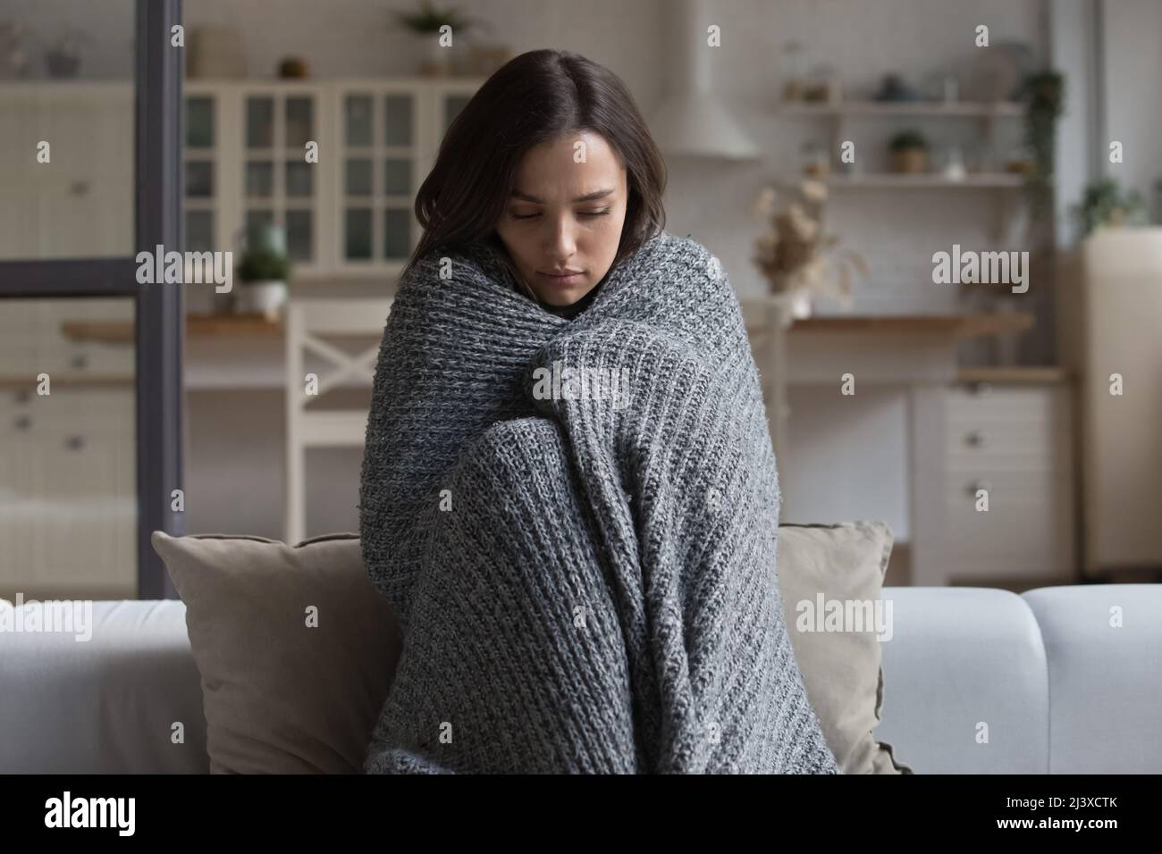 Sofa woman sit depress hi-res stock photography and images - Alamy