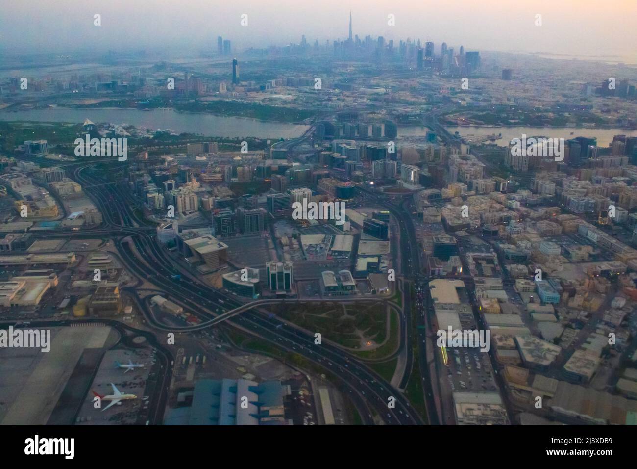 Evening view of Dubai Skyline under dark night sky seen from landing ...