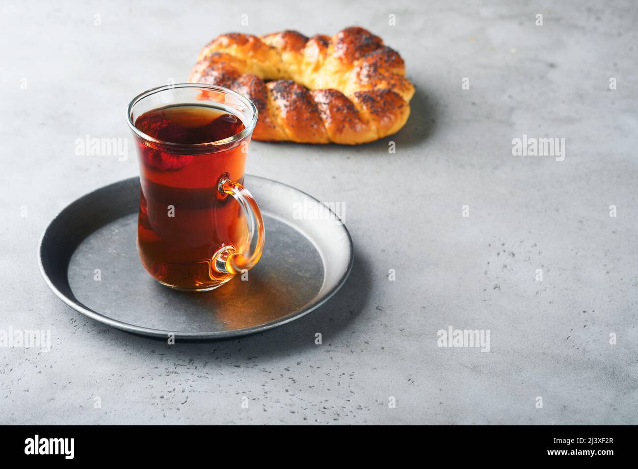 Turkish black tea. Glass cup of turkish black tea and crispy Turkish ...