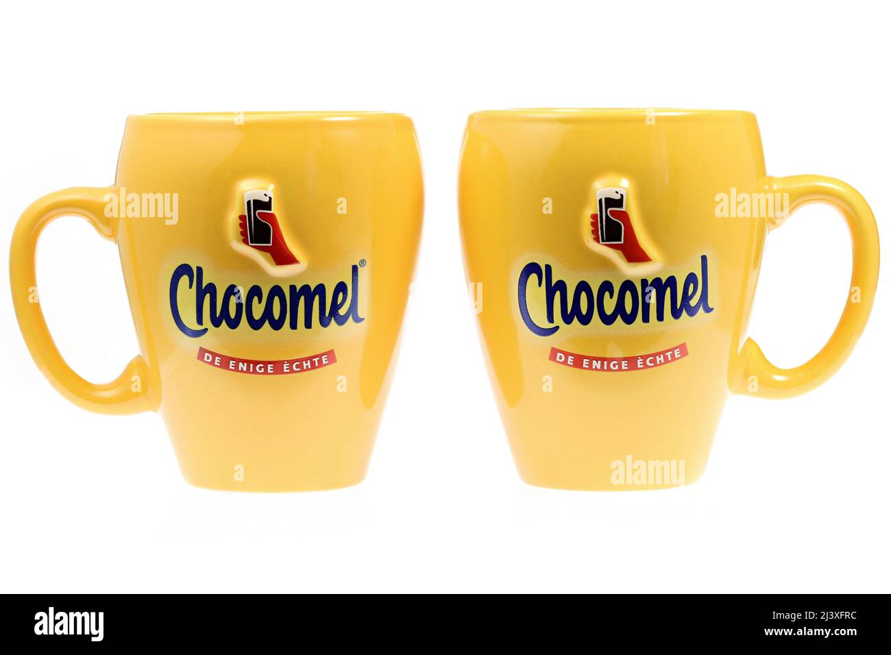 pair of Chocomel mugs with chocolate-flavoured milk isolated on white ...
