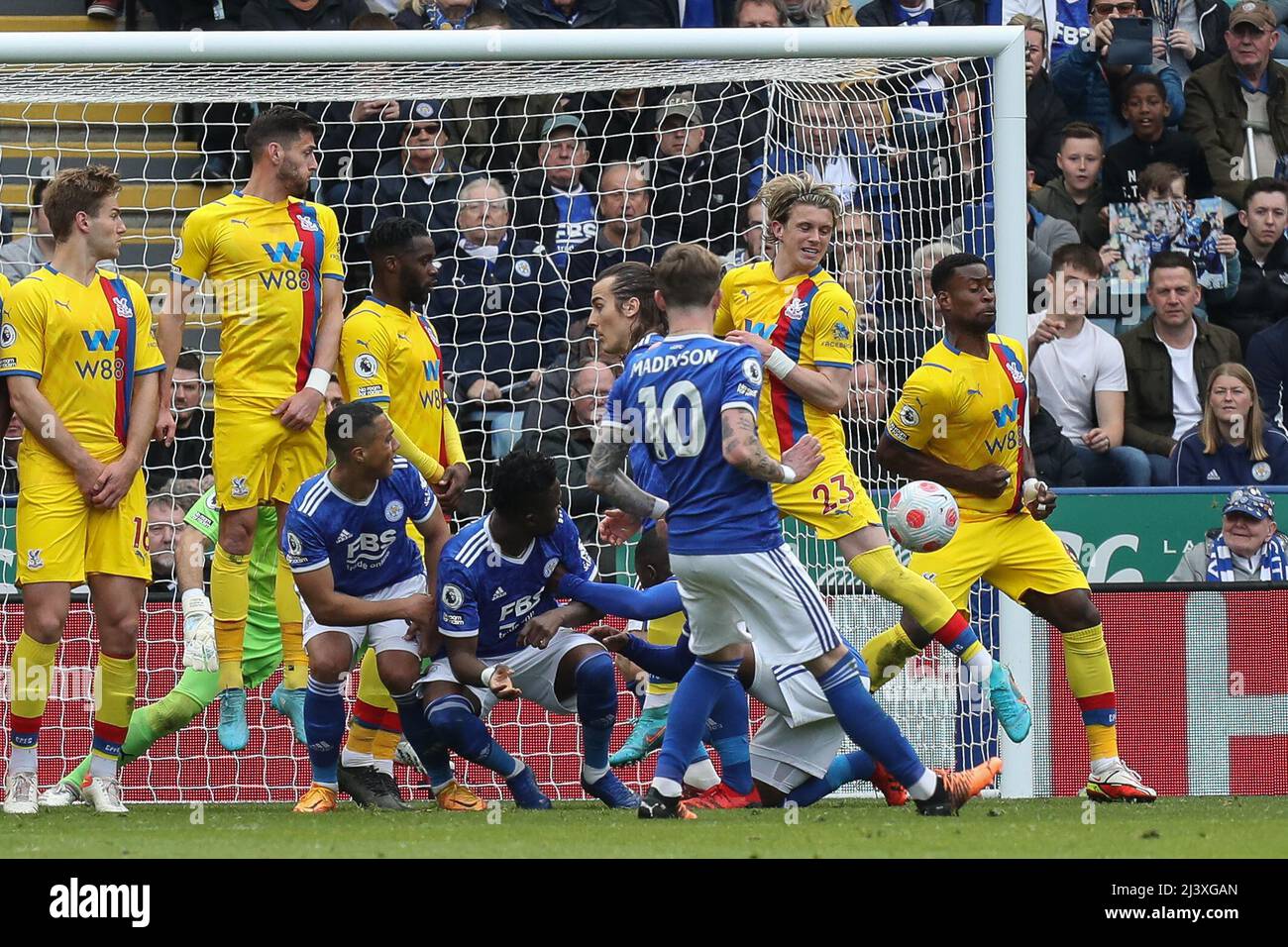 James Maddison #10 of Leicester City takes the free kick but is blocked ...