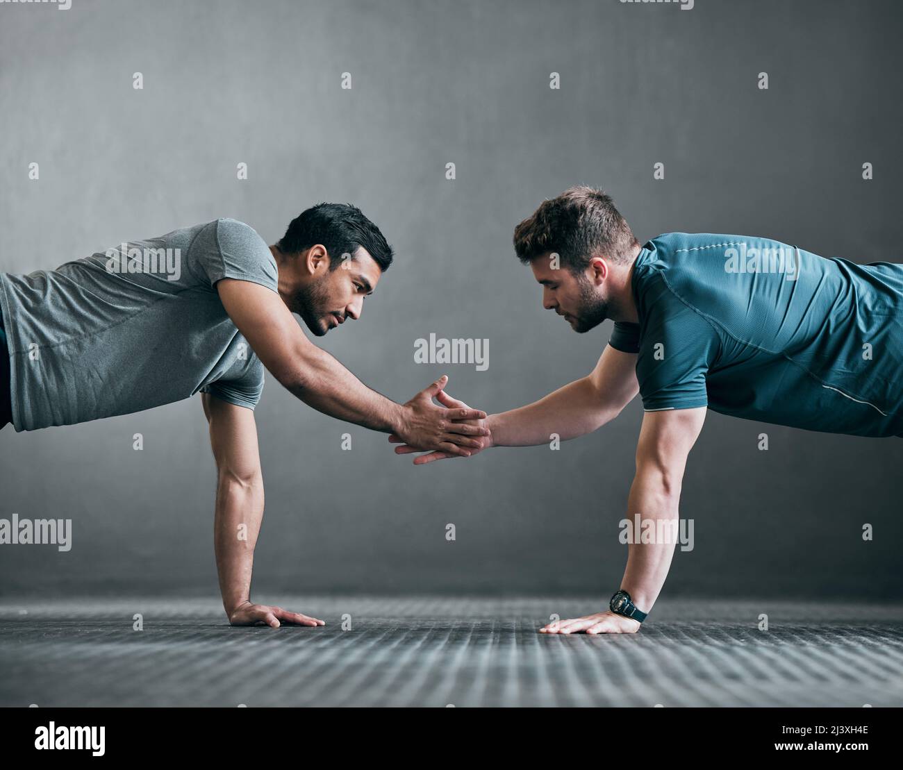Its important to have support. Full length shot of two handsome young ...