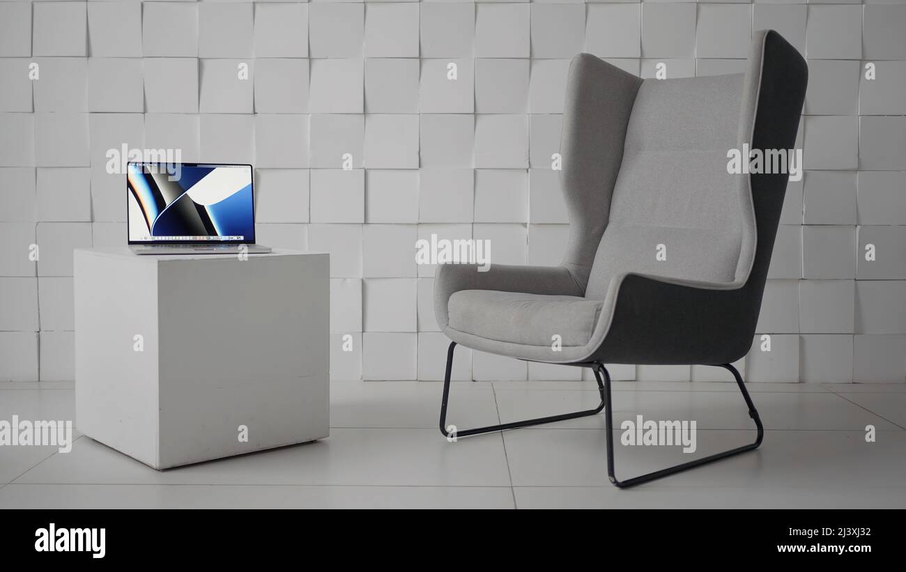 Comfortable workplace. Action. A wonderful place with a white armchair ...