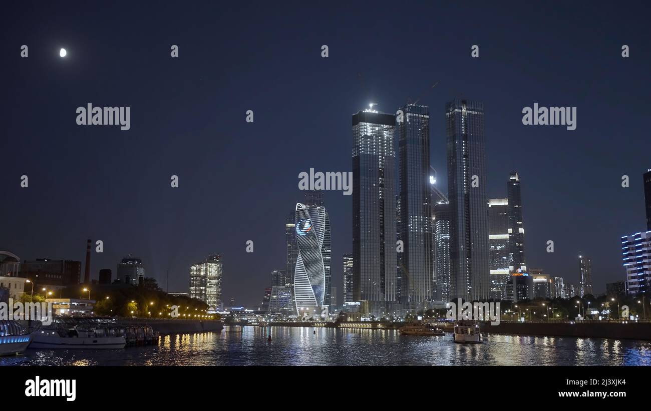 Late evening cityscape with Moscow city skyscrapers on dark blue night ...