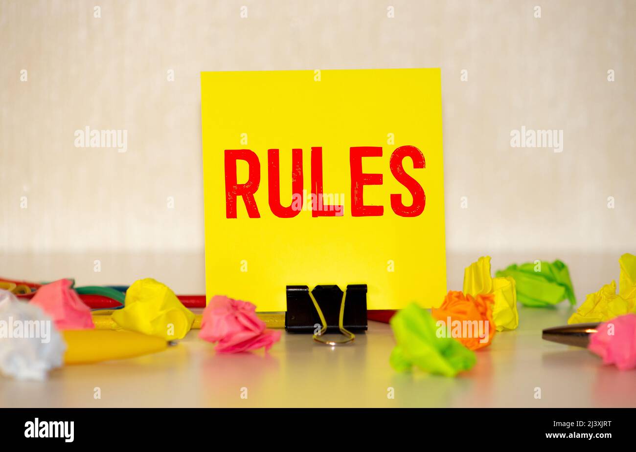 A sheet of paper with the NEW RULES, View from above Stock Photo - Alamy