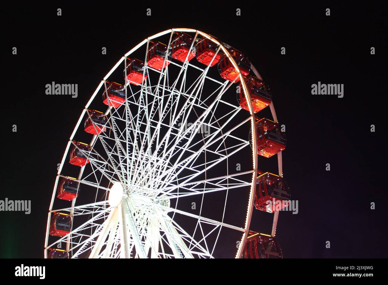 A Fun Fair Ferris Big Wheel Lit Up at Night Stock Photo - Alamy