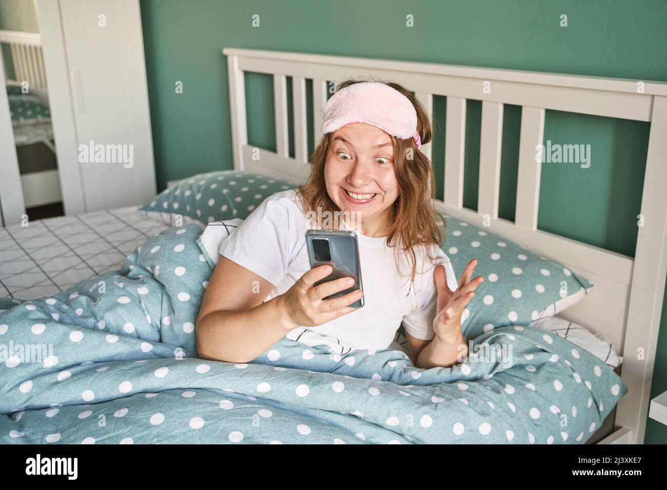 Woman texting home rear view hi-res stock photography and images - Alamy