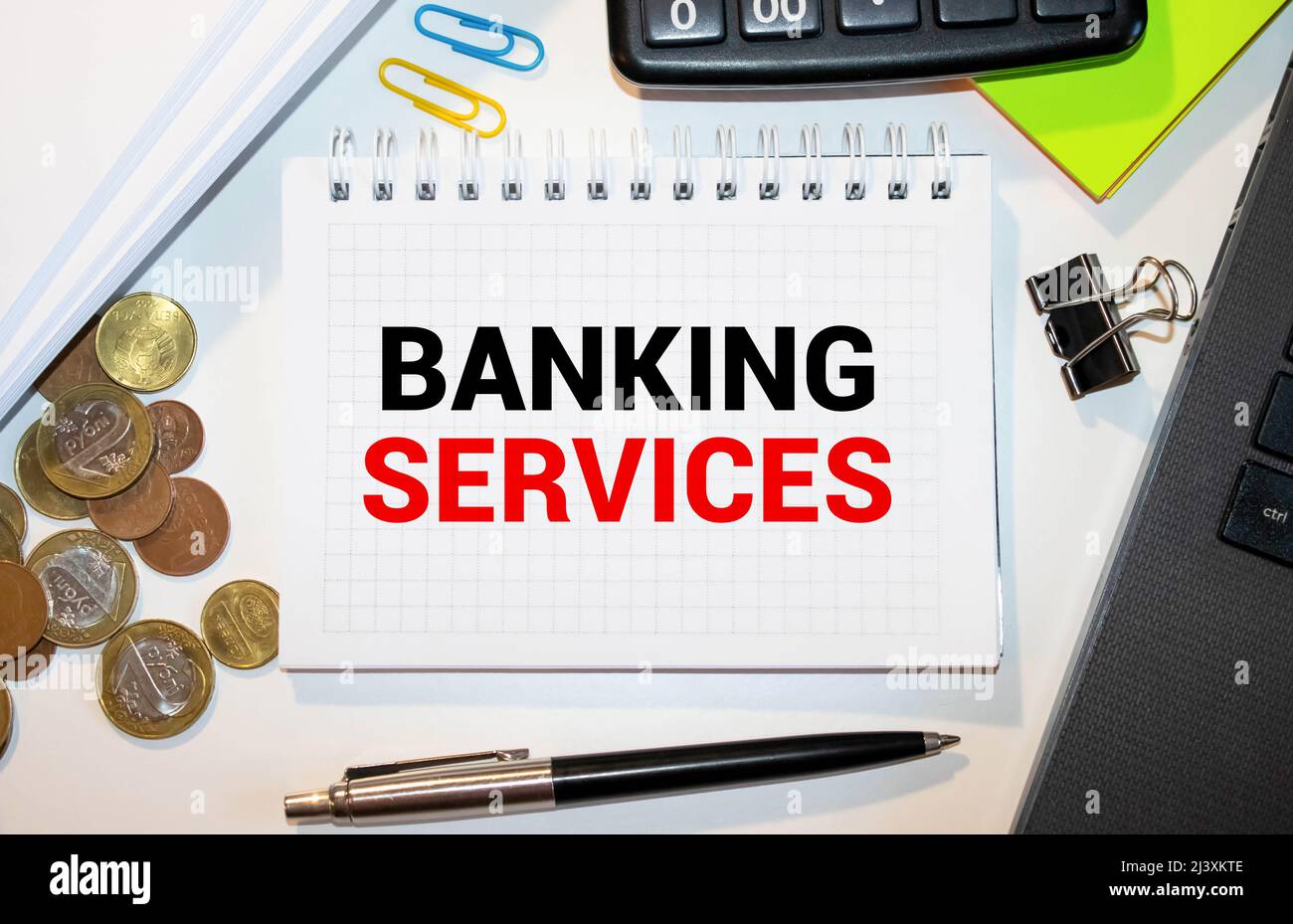 Business and finance. Behind torn white paper on a red background, the ...