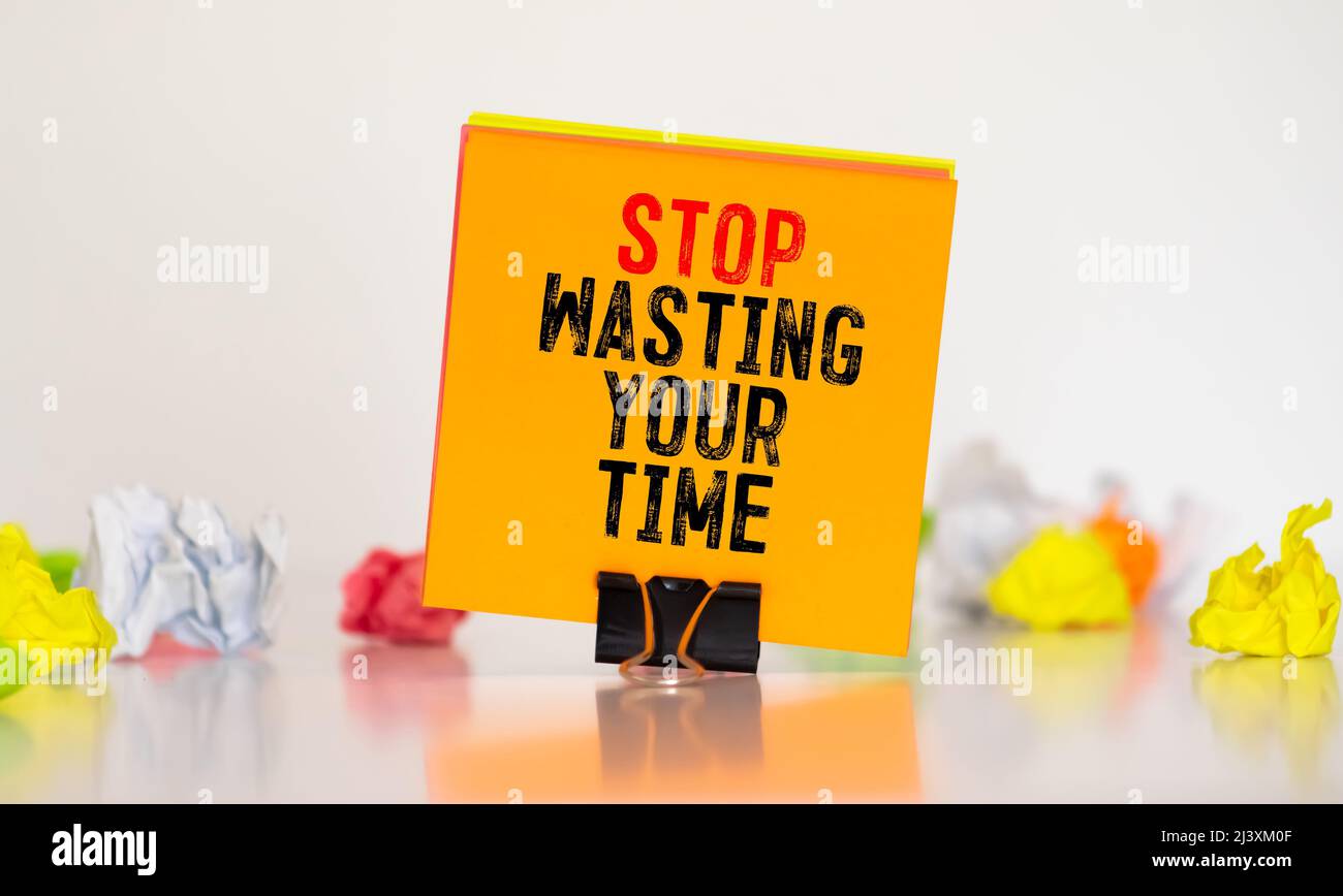 Writing Motivational Text Stop Wasting Your Time Stock Photo - Alamy
