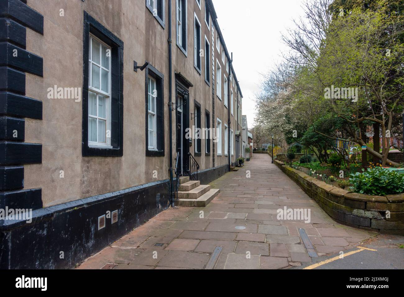 An alleyway behind some terraced houses in Penrith, Cumbria, UK Stock ...