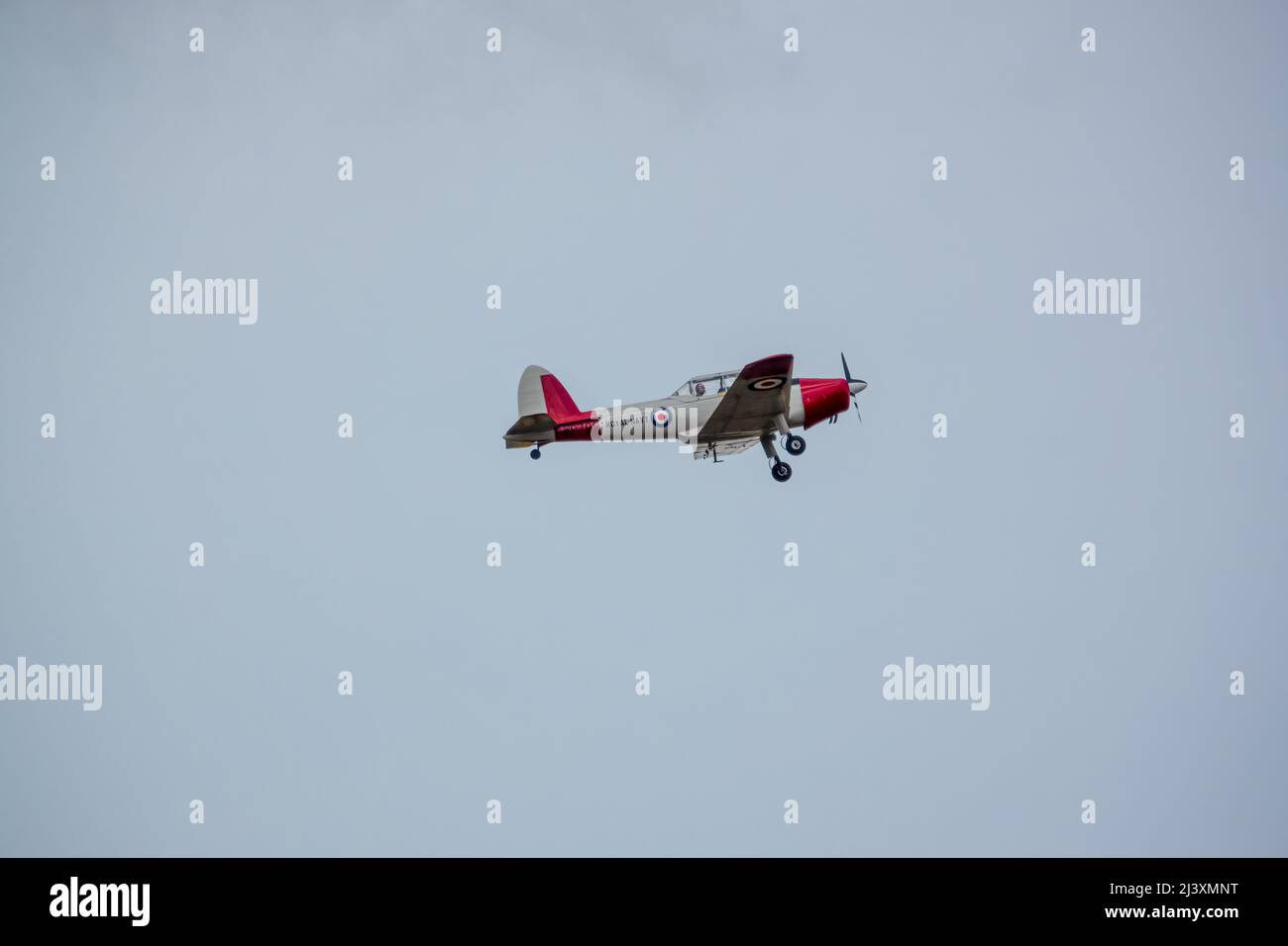 An Easyjet Airbus A320 twin engine jet airliner in deep blue sky with ...