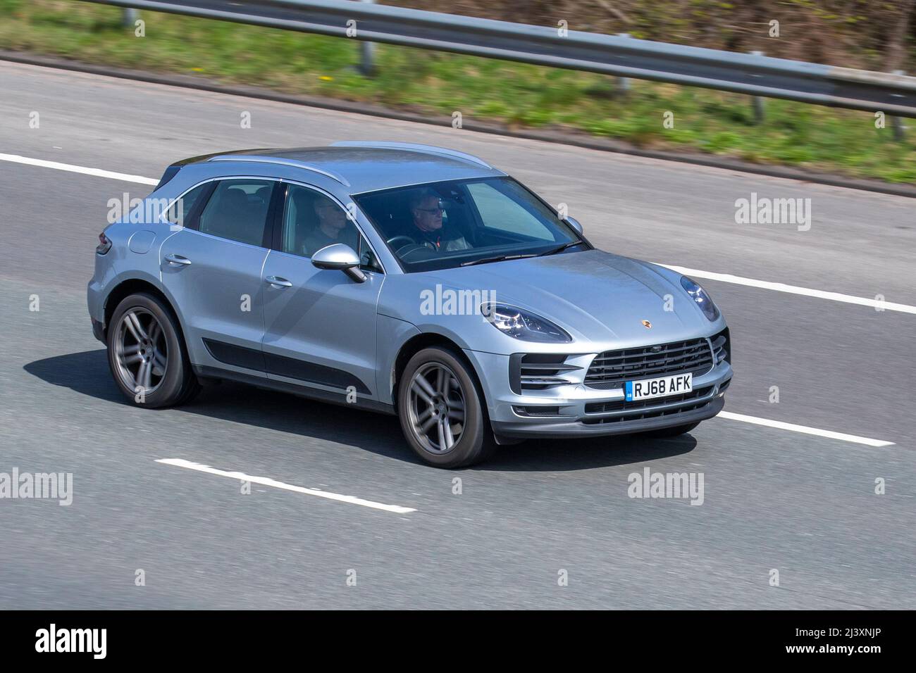 2018 silver Porsche Macan PDK 1984cc 7 speed semi-automatic; driving on ...
