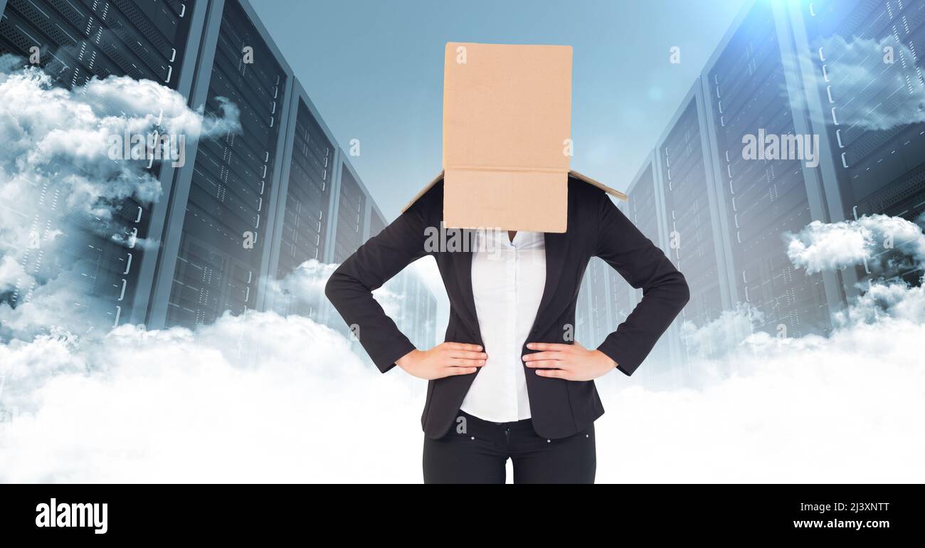 Cardboard box over the head of businesswoman against computer servers ...