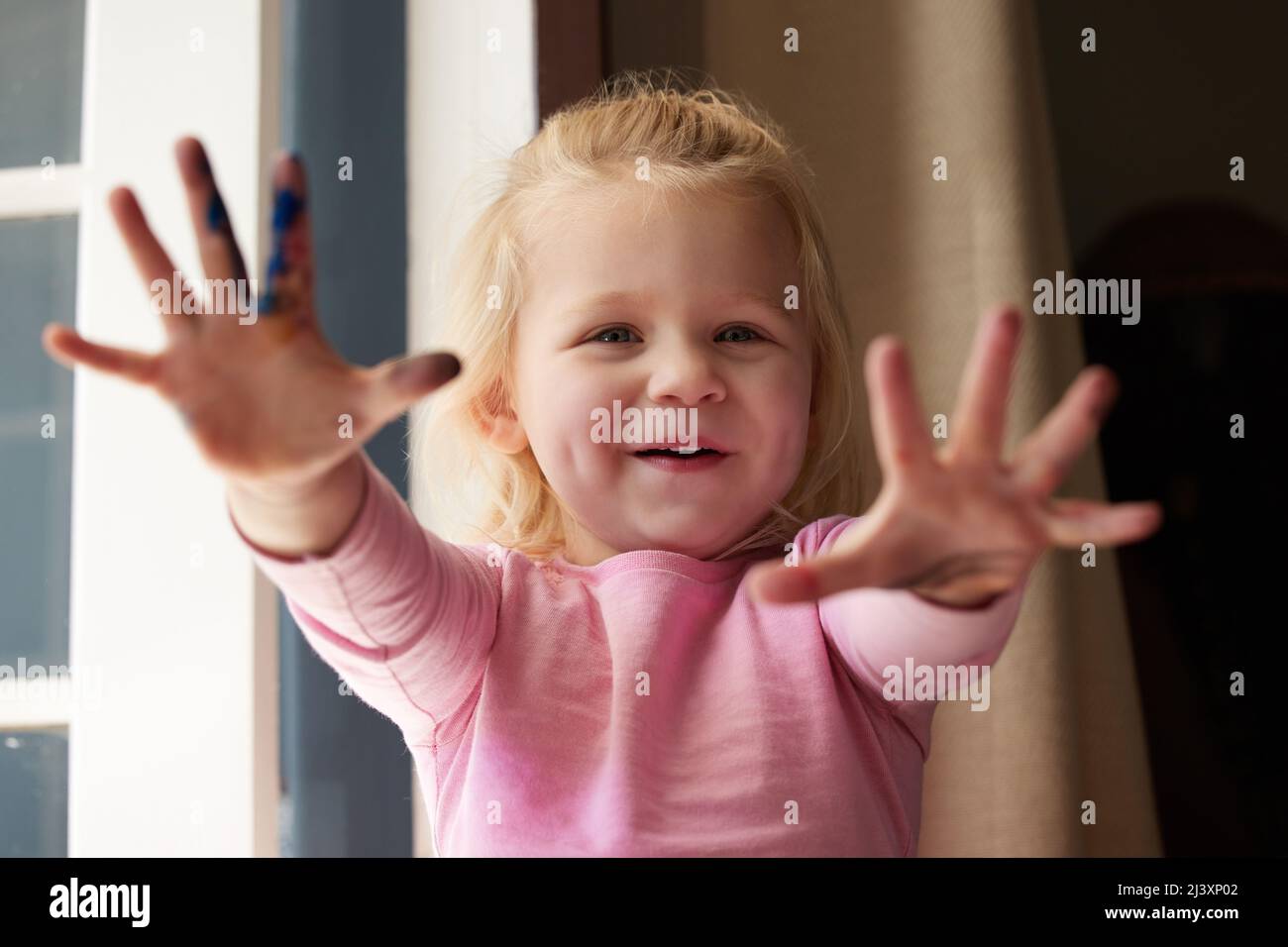 You gotta get messy if you want to have real fun. Shot of an adorable ...