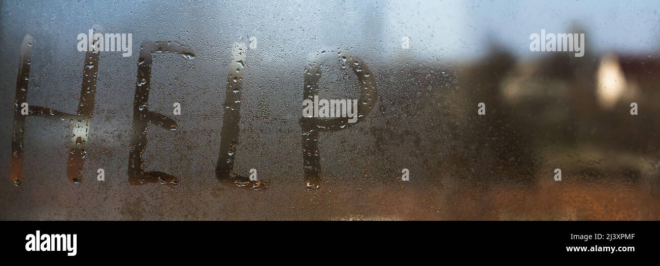 The inscription on the fogged window. Help Stock Photo - Alamy