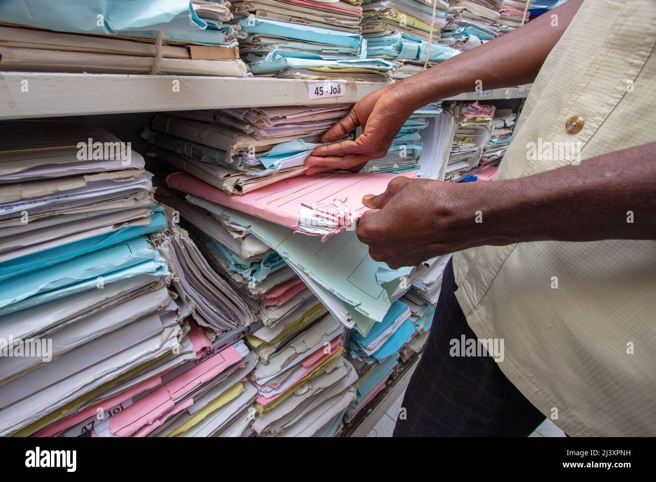 File lookup in a physical archive in the public sector Stock Photo - Alamy