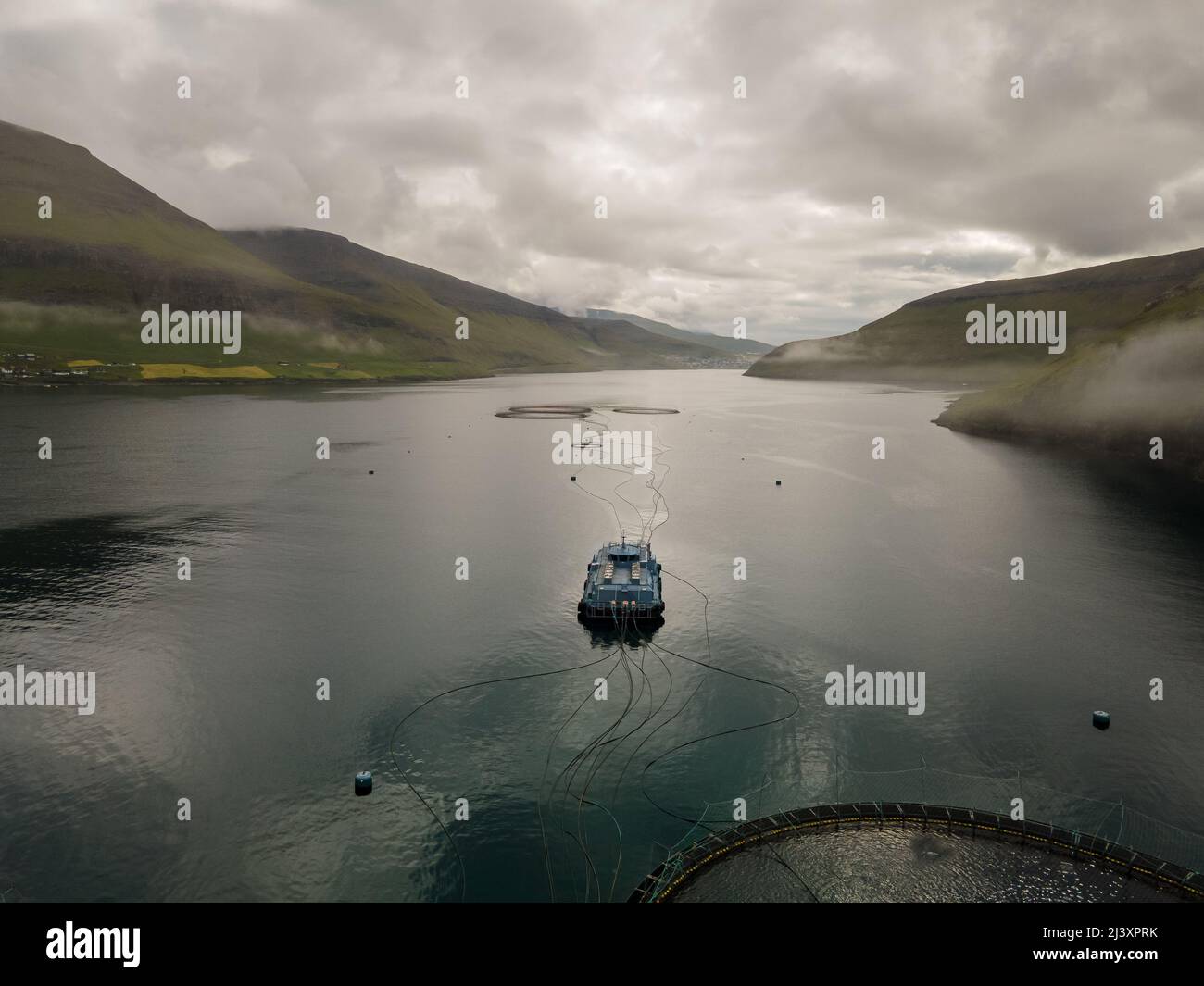 Beautiful cinematic aerial footage of the Salmon fishing farm pools and ...